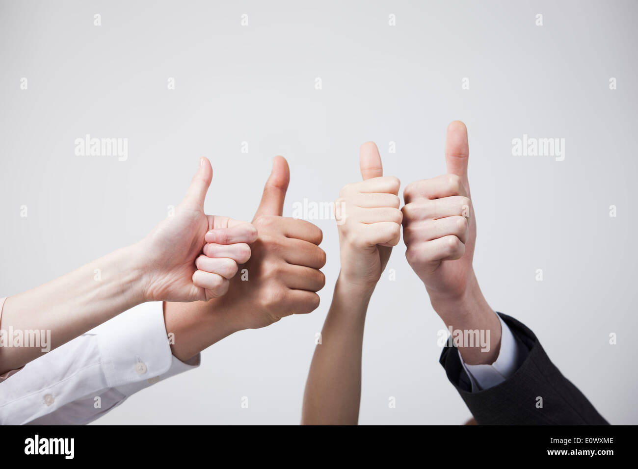 people showing thumbs up Stock Photo - Alamy
