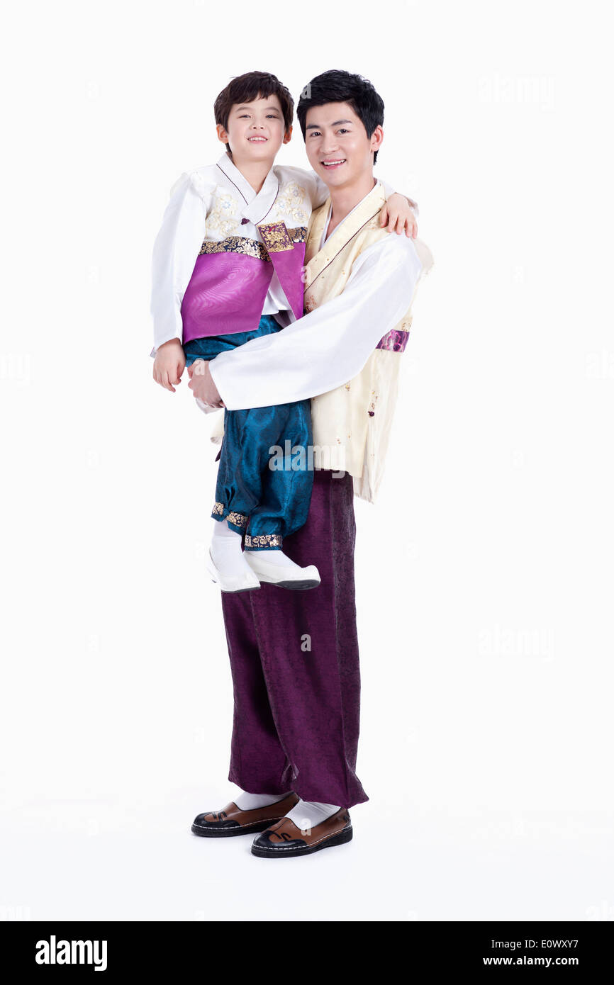 father and son wearing traditional Korean outfits Stock Photo - Alamy