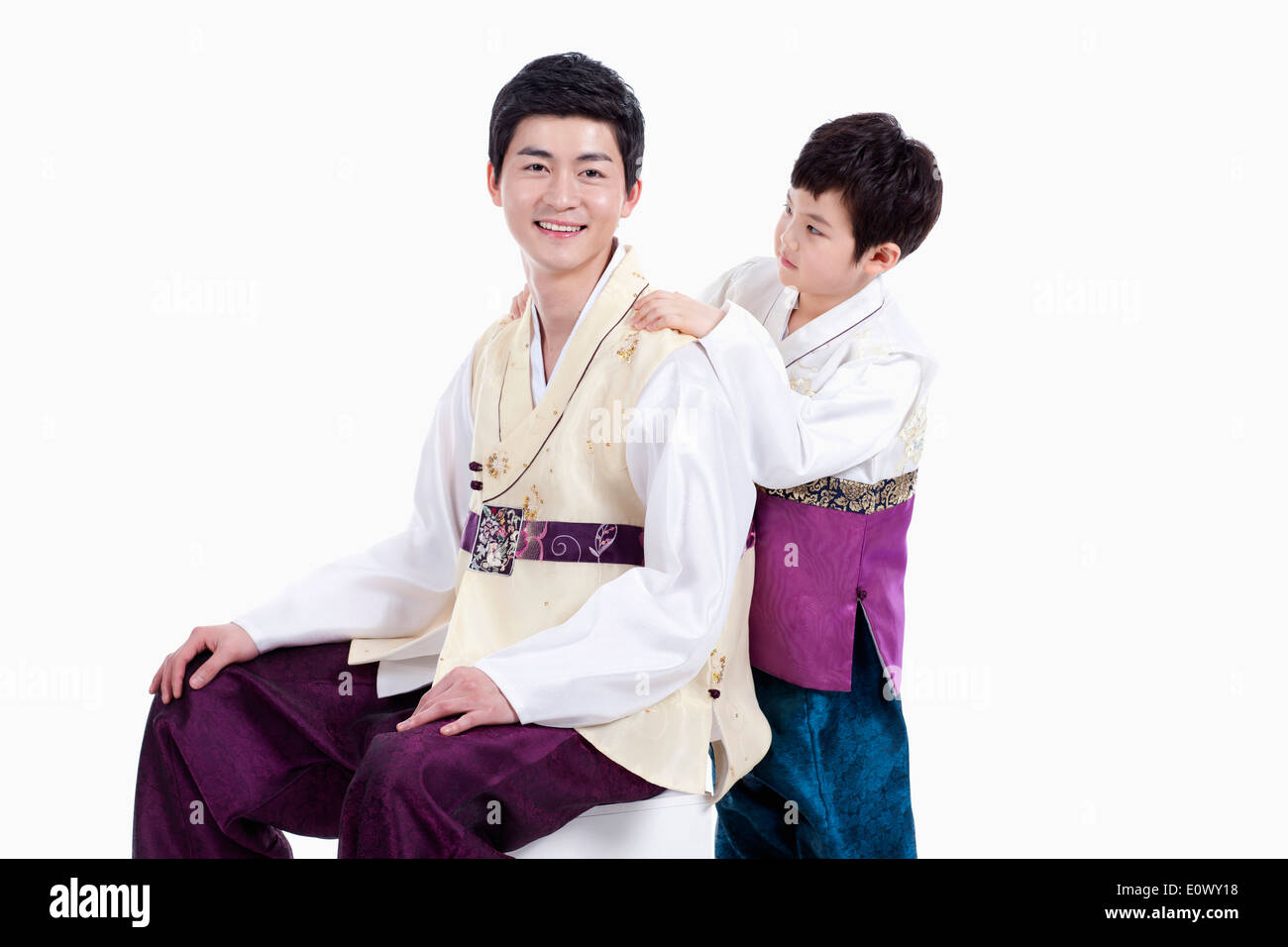father and son wearing traditional Korean outfits Stock Photo - Alamy