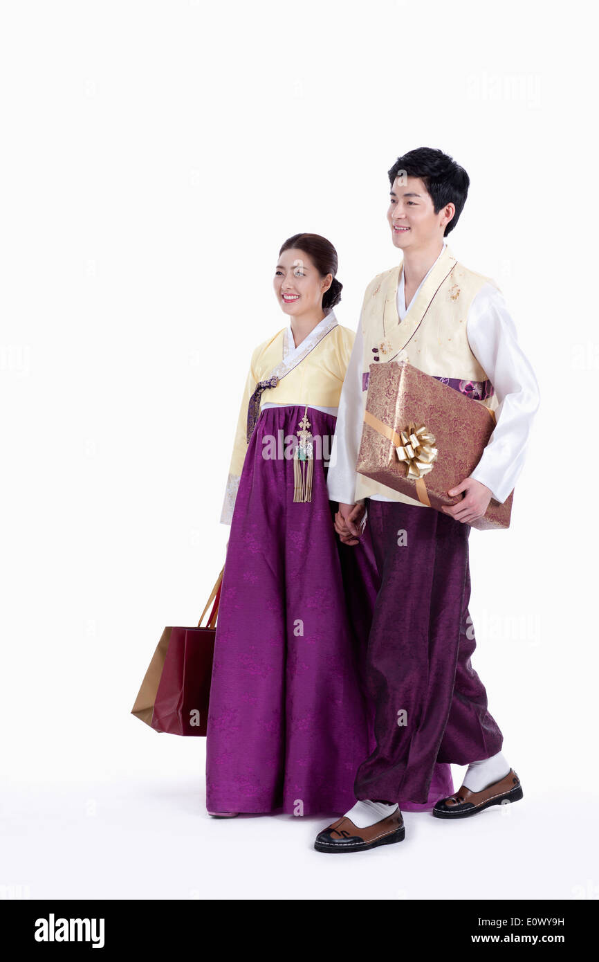 Woman wearing traditional hanbok holding hi-res stock photography and ...