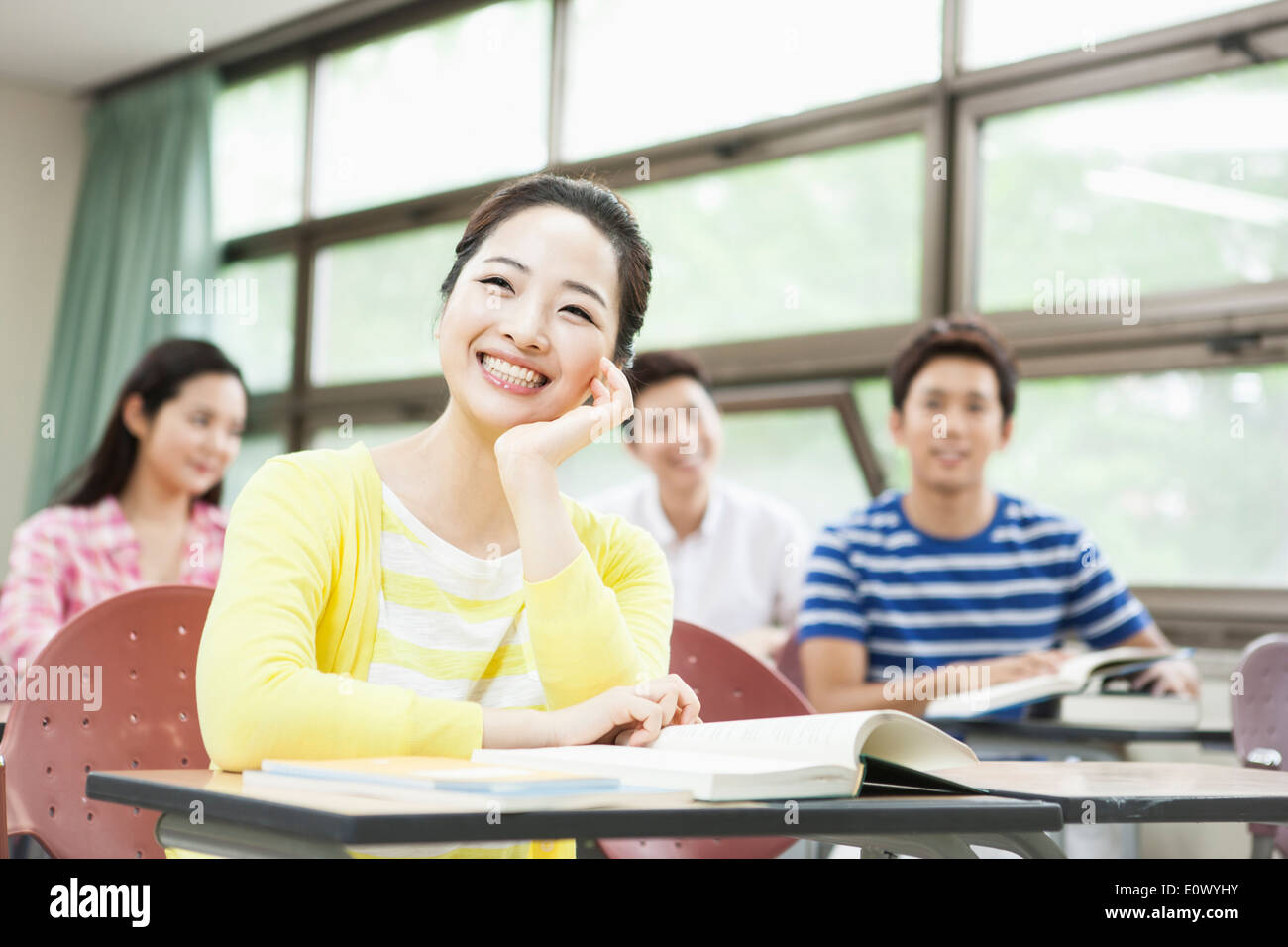 a woman studying in class Stock Photo - Alamy