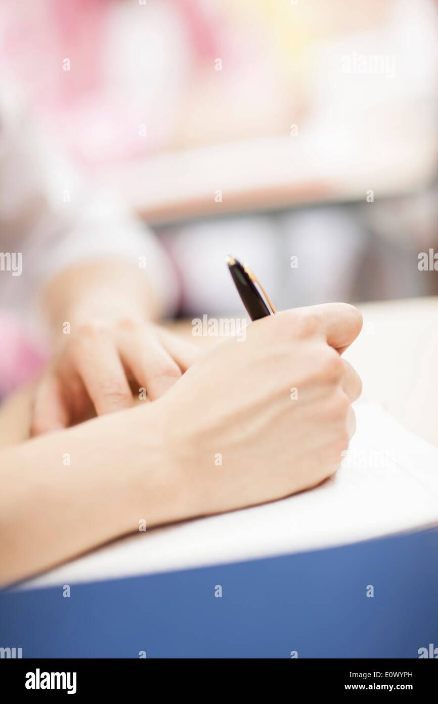 a man studying in class Stock Photo - Alamy
