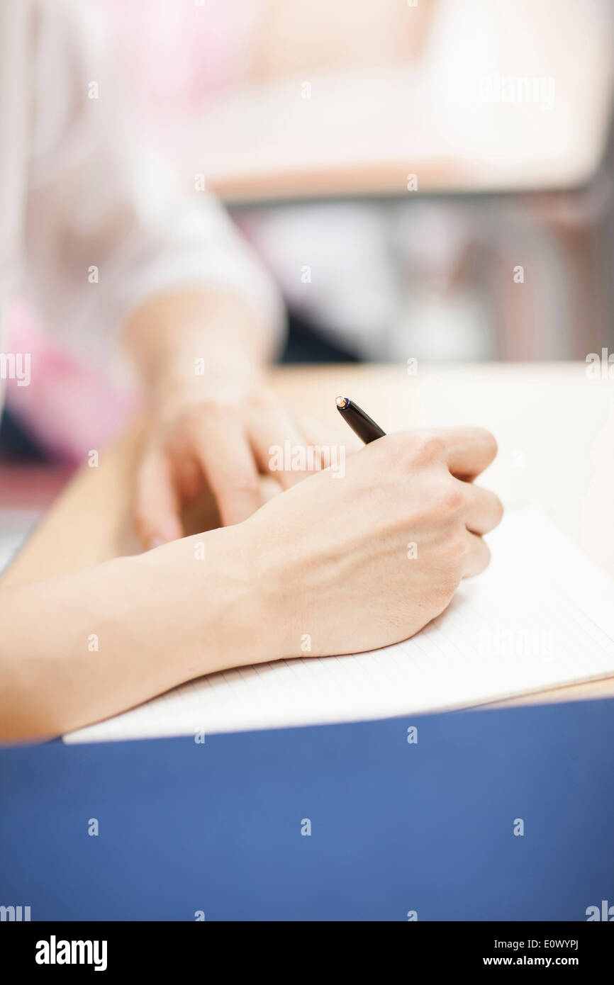 a man studying in class Stock Photo - Alamy