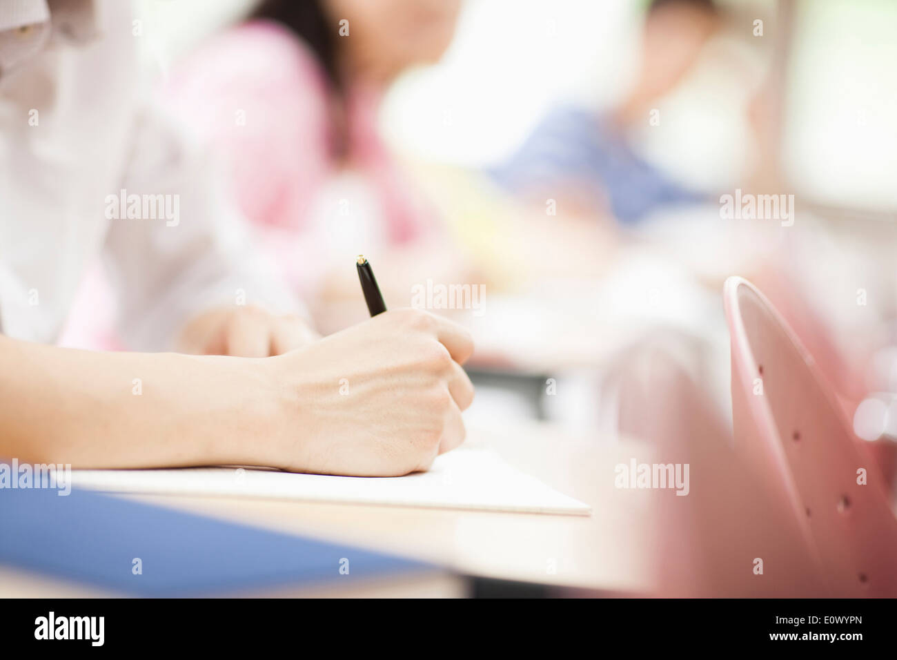 a man studying in class Stock Photo - Alamy