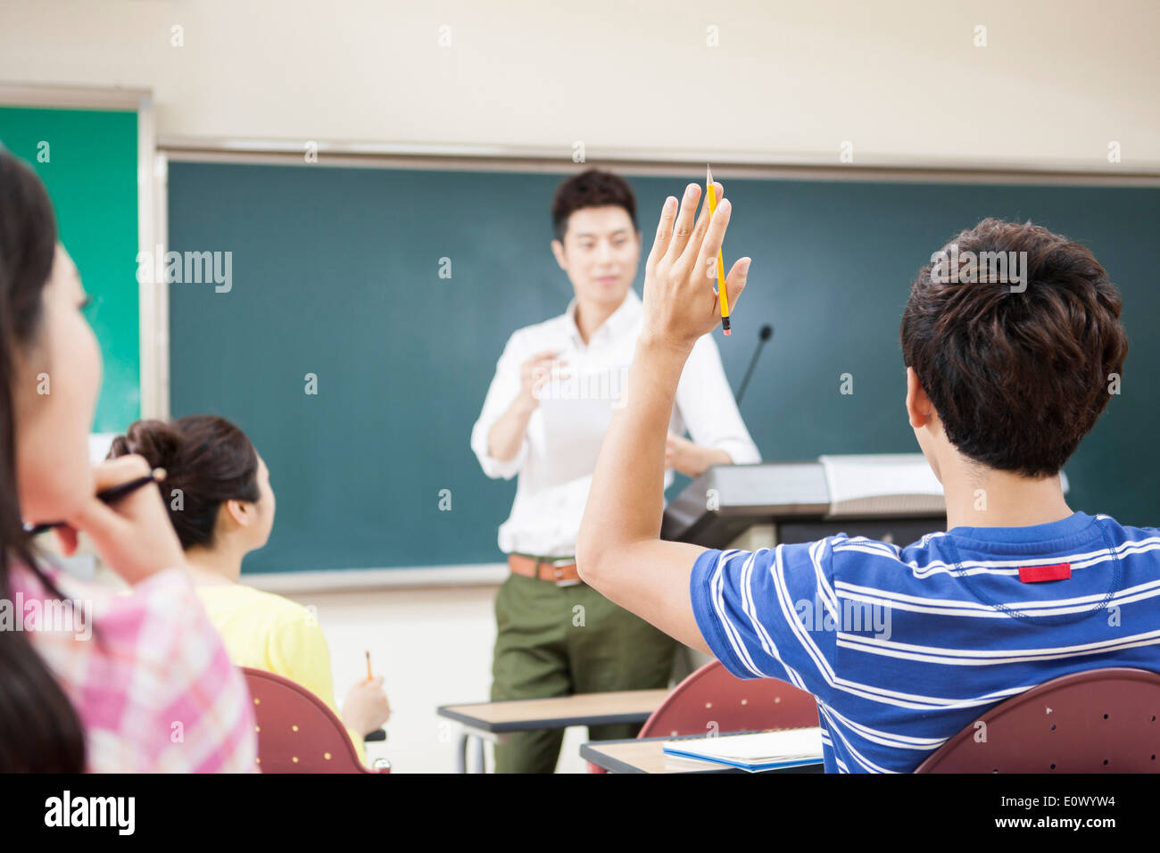 lecturer teaching the class Stock Photo - Alamy