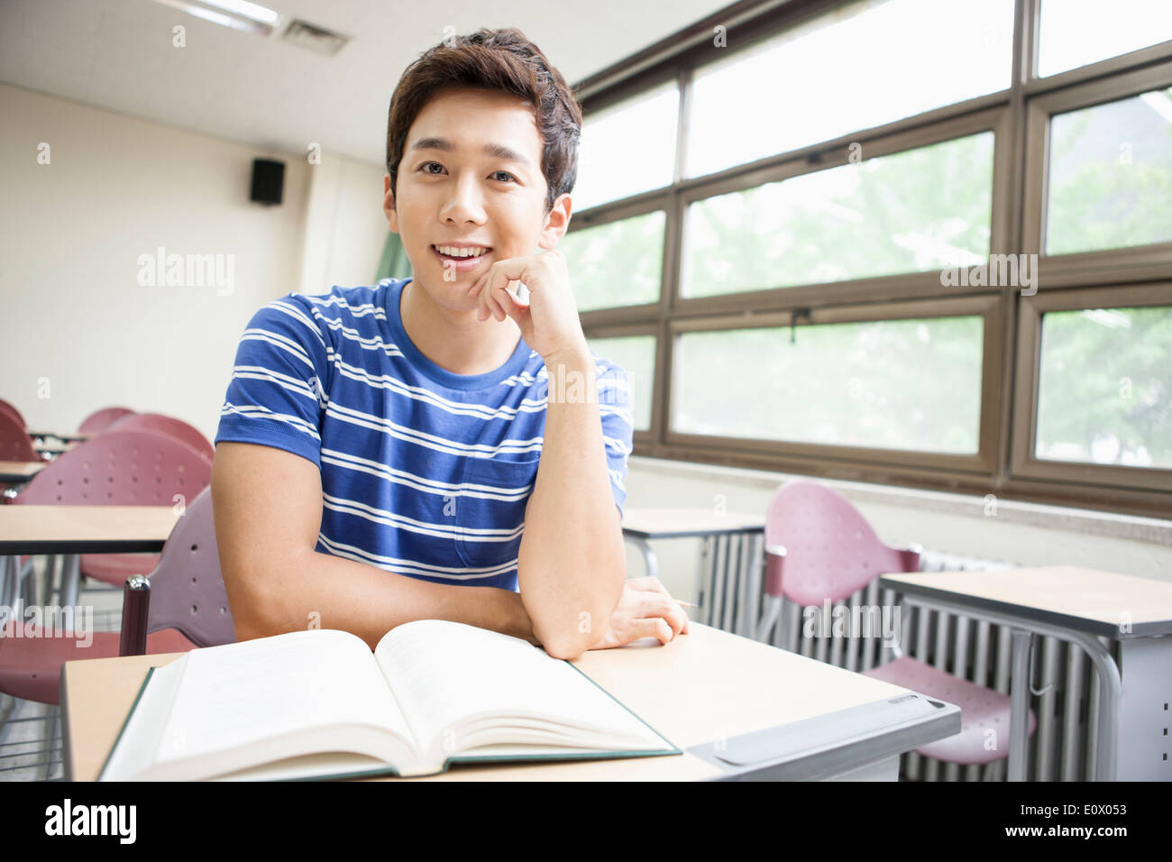 a man studying in class Stock Photo - Alamy