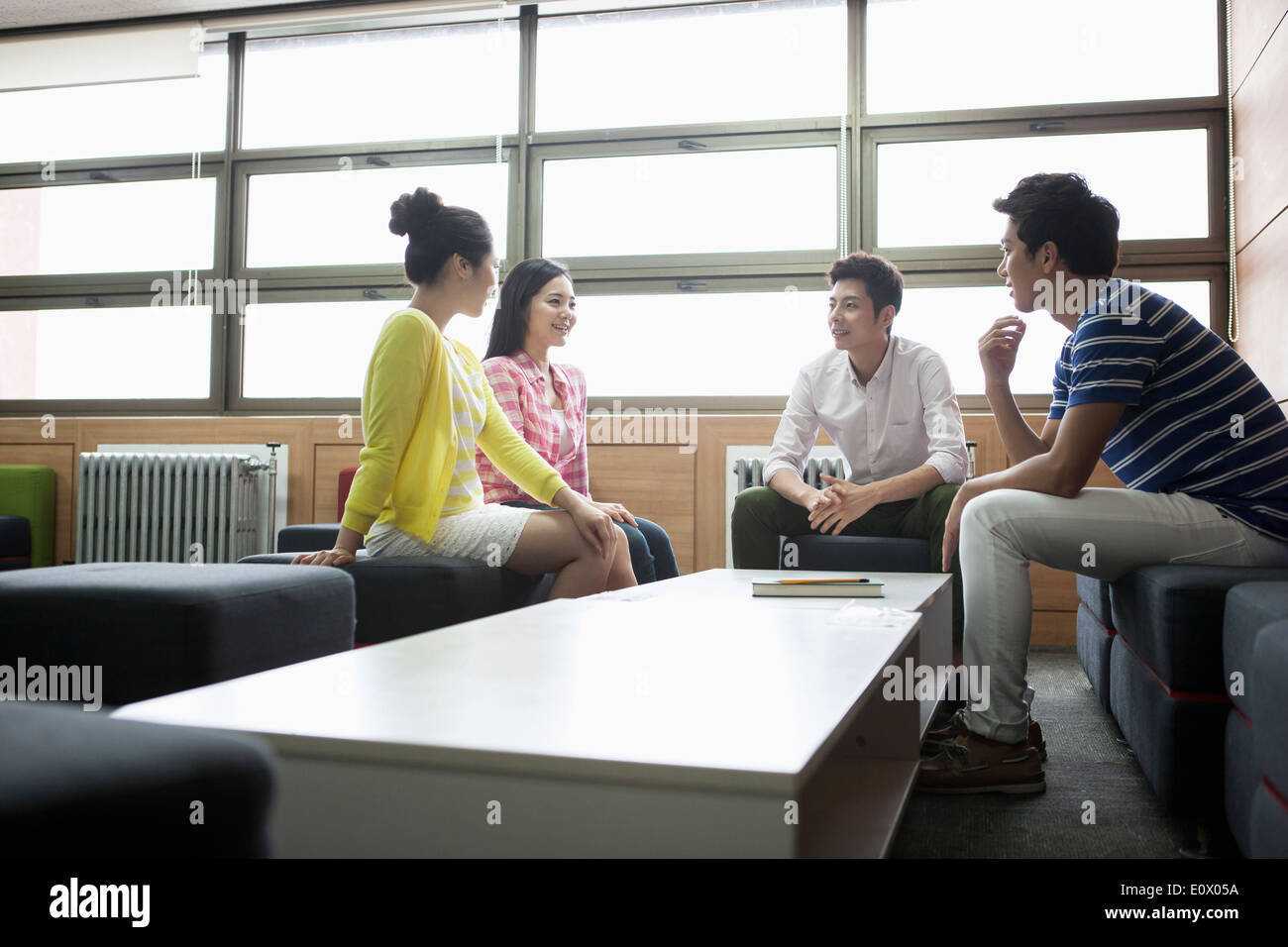 people chatting in the class room Stock Photo - Alamy