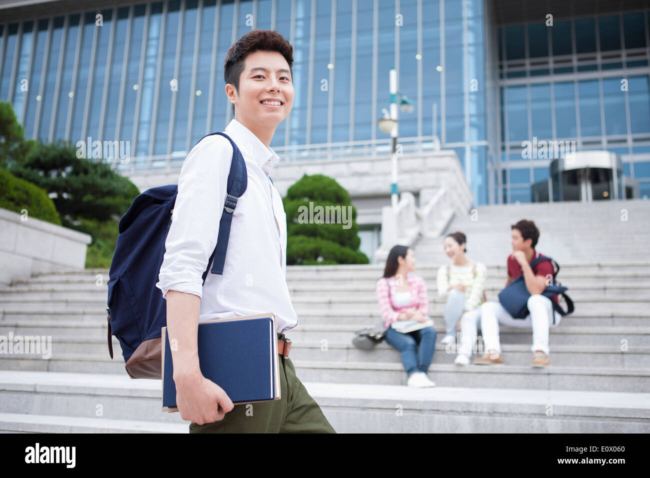 Students sitting down on stairs hi-res stock photography and images - Alamy