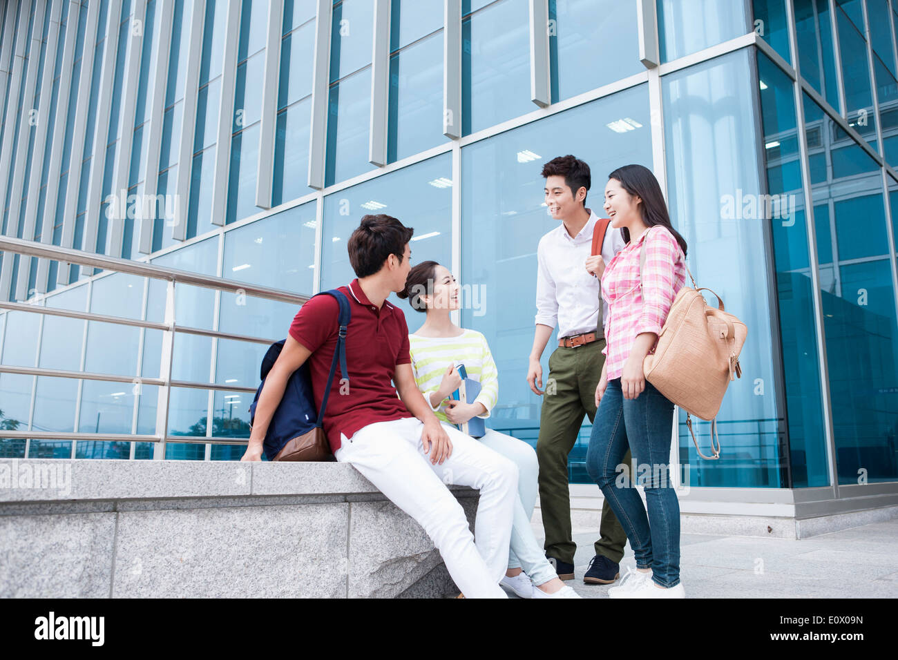 students chatting outside Stock Photo - Alamy
