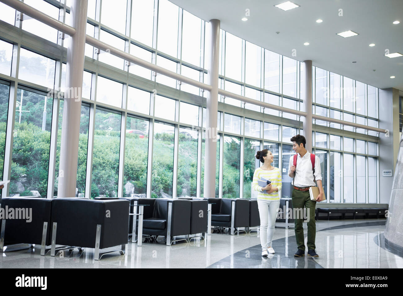 students walking in the hallway Stock Photo - Alamy