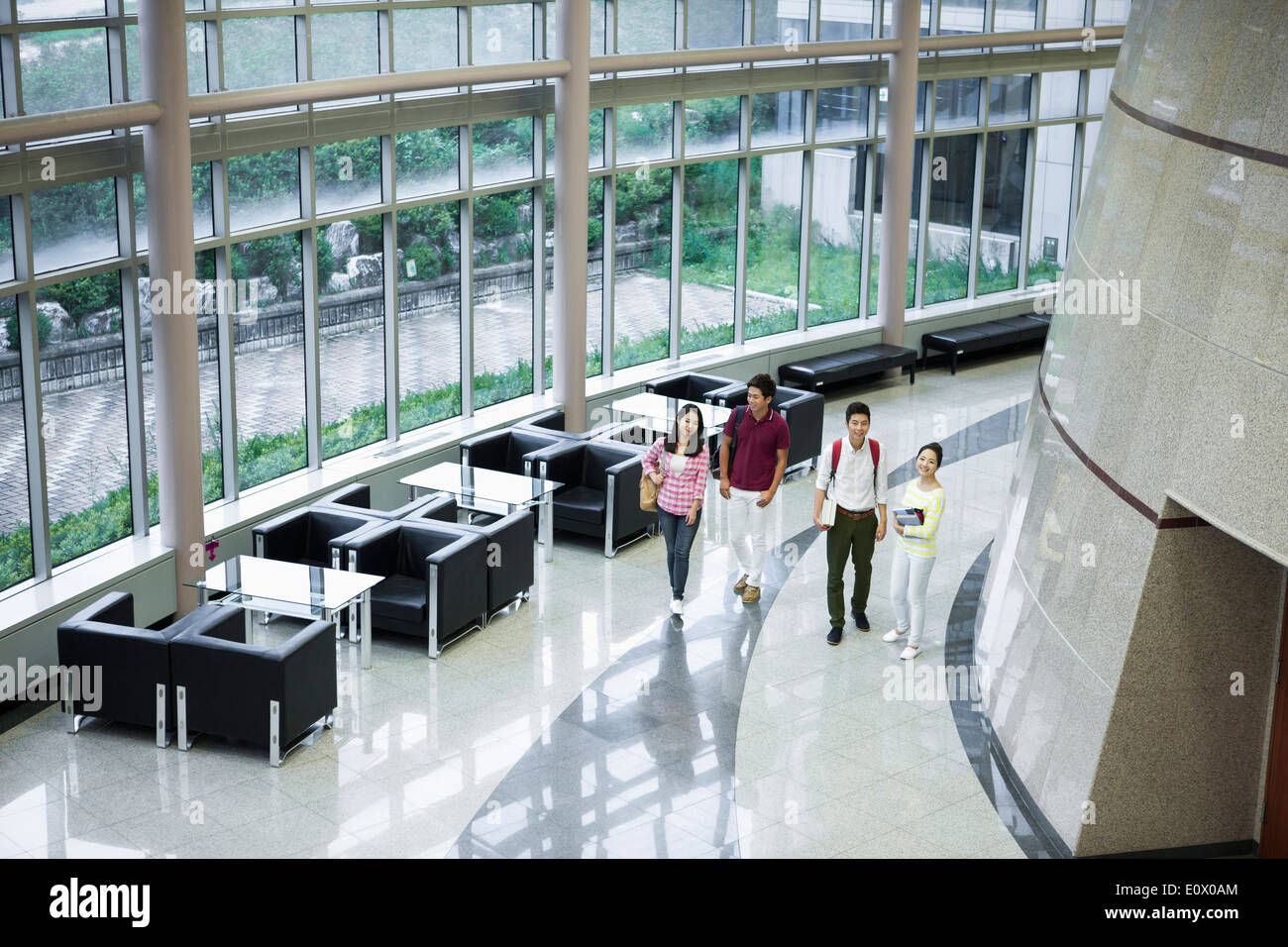 students walking in the hallway Stock Photo - Alamy