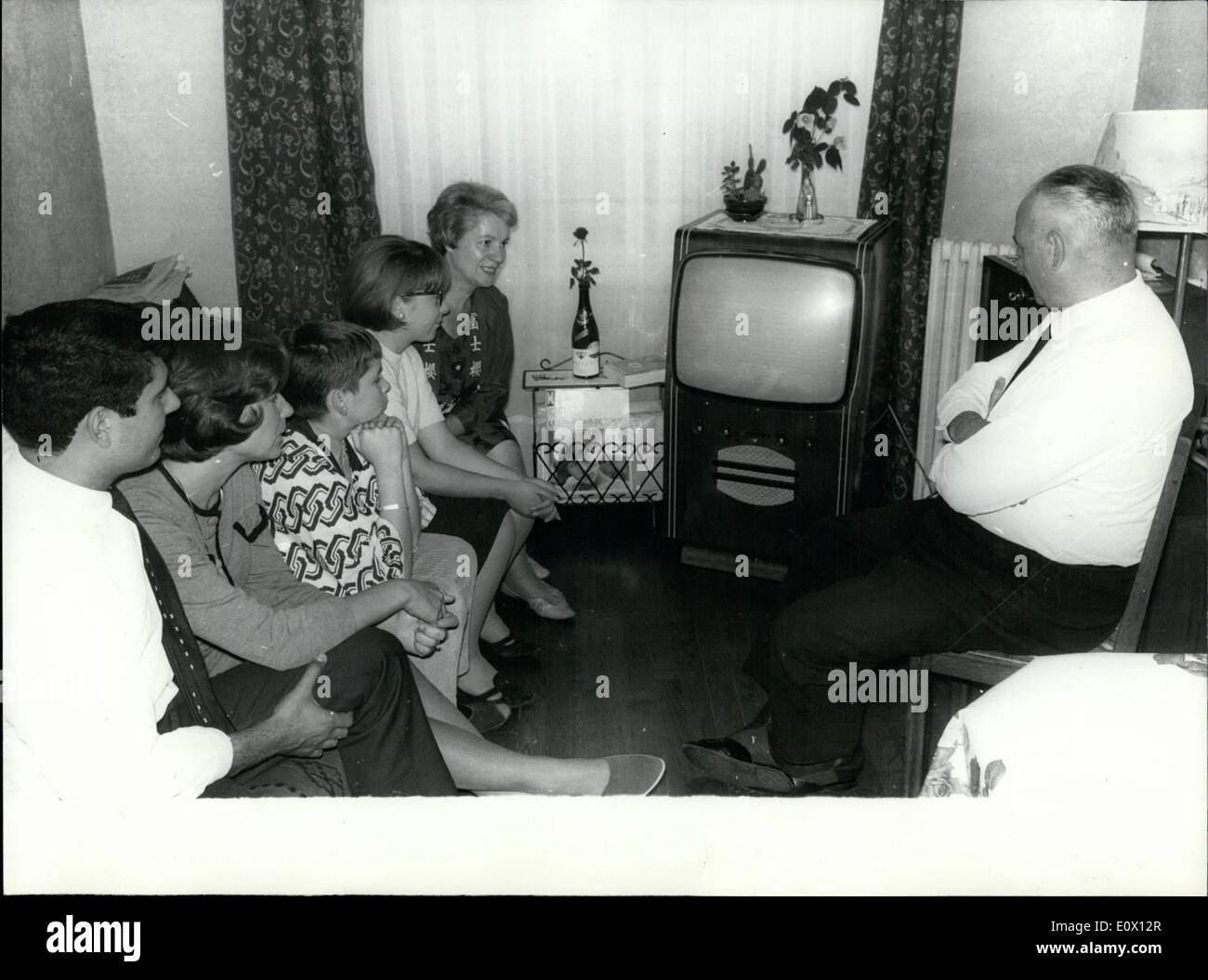 Oct. 10, 1964 - Kiki Caron's family watch the swimmer's success on t.v ...