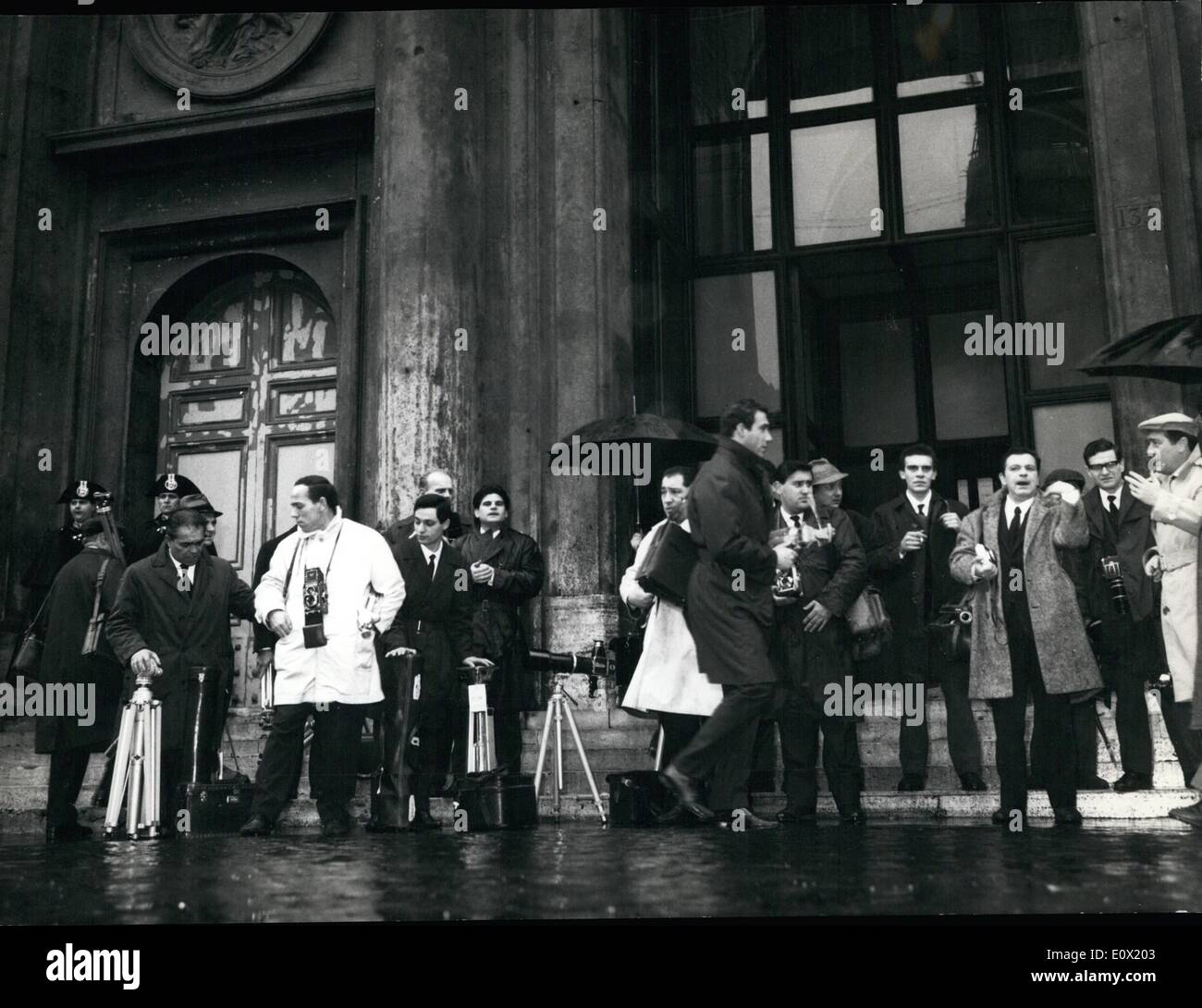 Dec. 12, 1964 - A group of Roman photographs standing before the ...