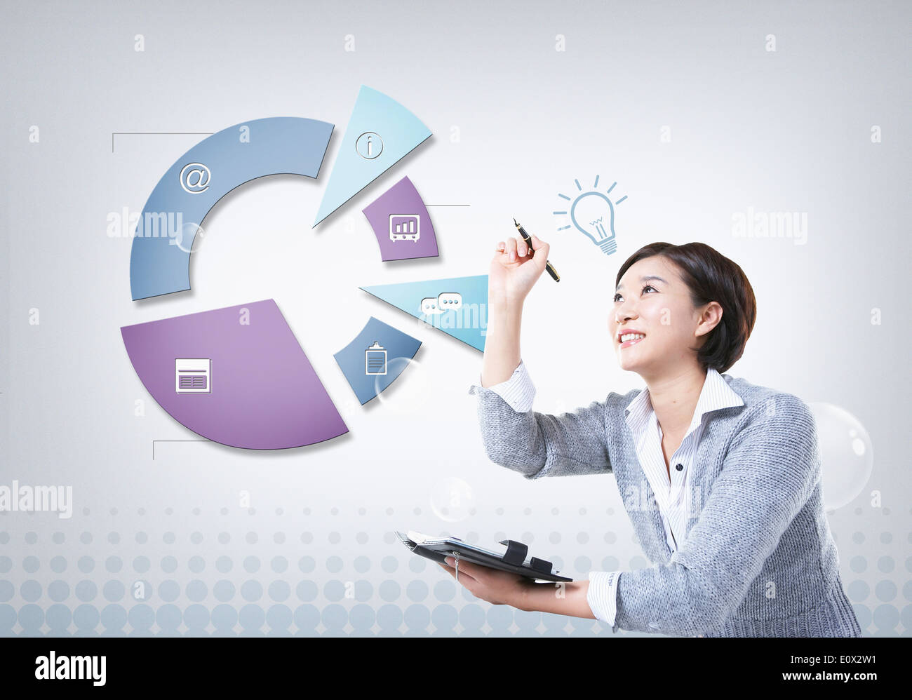 a business woman looking at data charts Stock Photo - Alamy