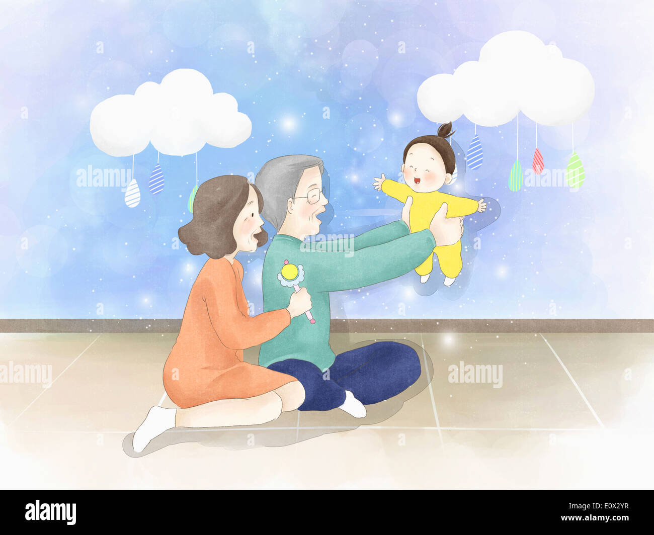 an old couple playing with a baby Stock Photo - Alamy