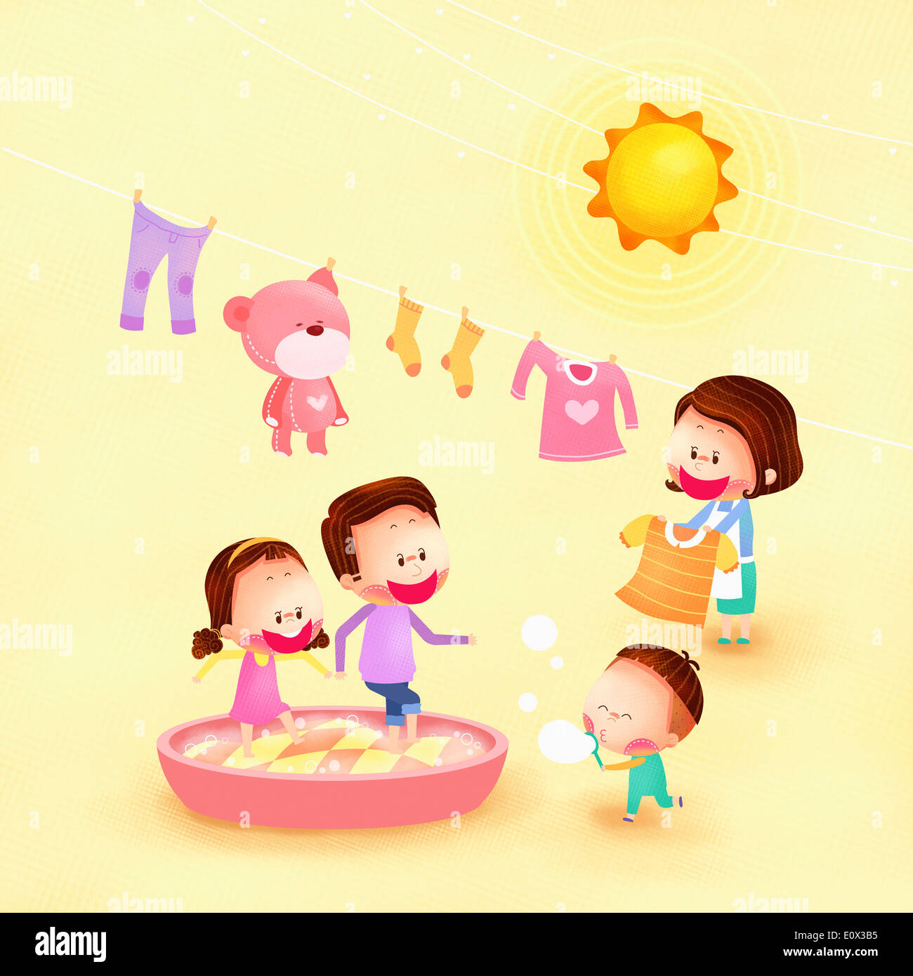 a family playing in the sun together Stock Photo - Alamy