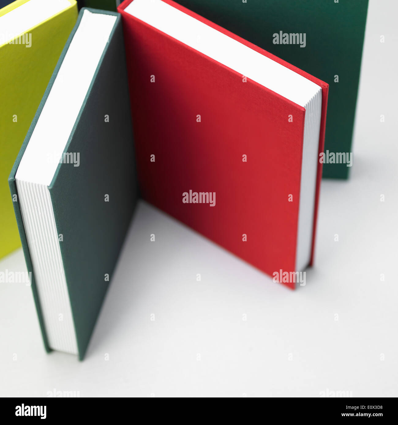 several books standing with backs to each other Stock Photo - Alamy