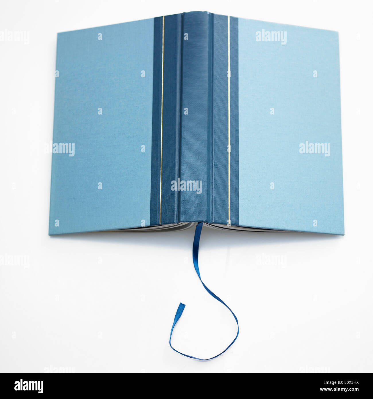 an opened book upside down Stock Photo - Alamy