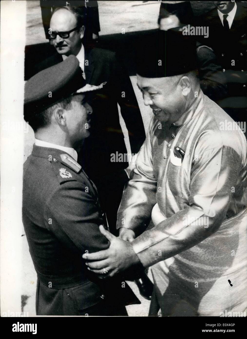 Apr. 04, 1965 - King of Malaysia in Jordan: Photo shows King Hussein (left) seen as welcomed ...