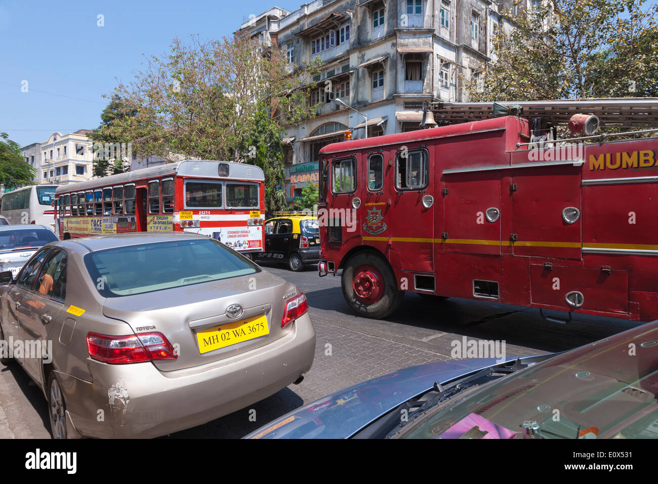 Fire Engine trying to get through the heavy traffic in Mumbai India ...