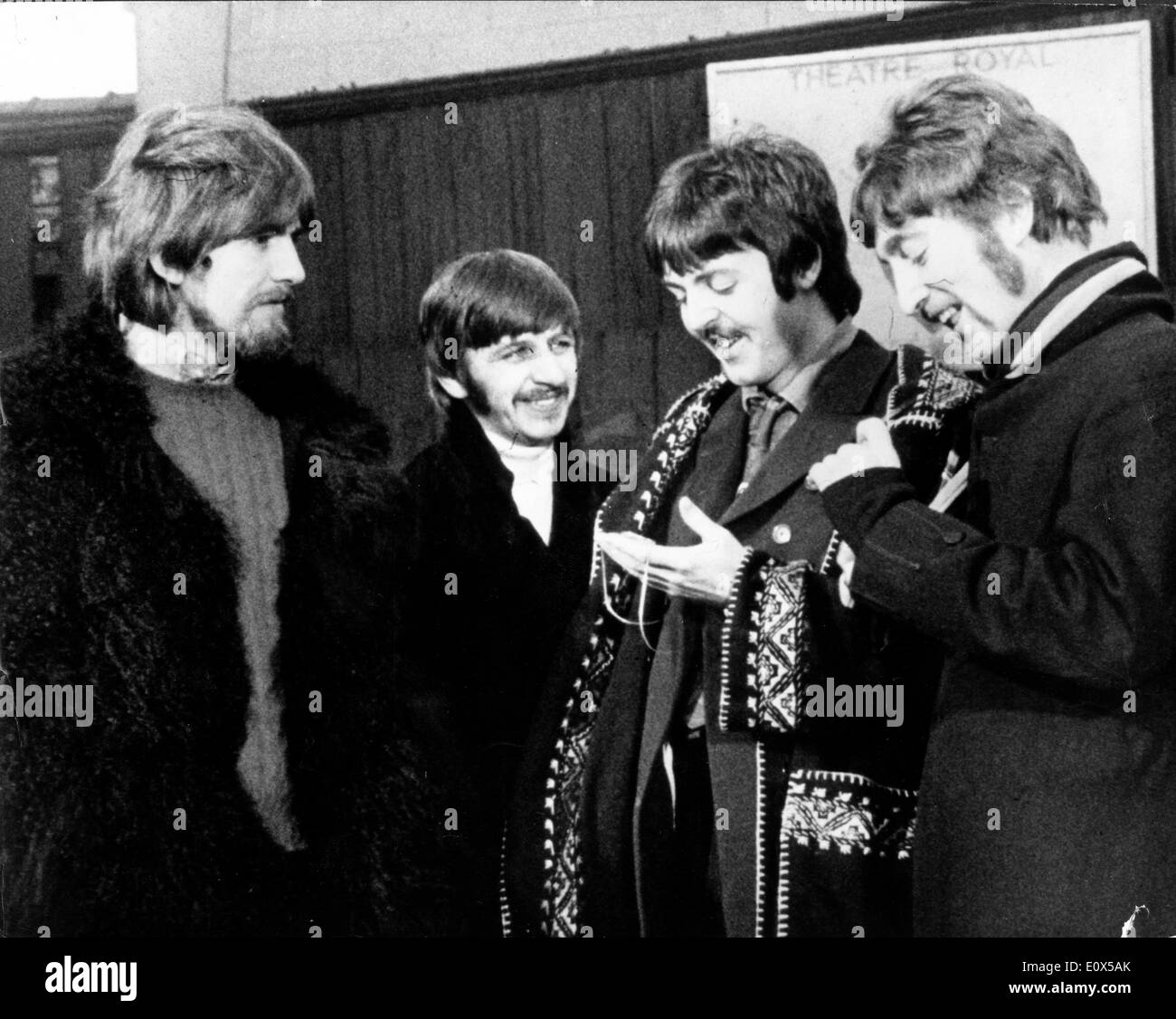 The Beatles play with stop watches Stock Photo - Alamy