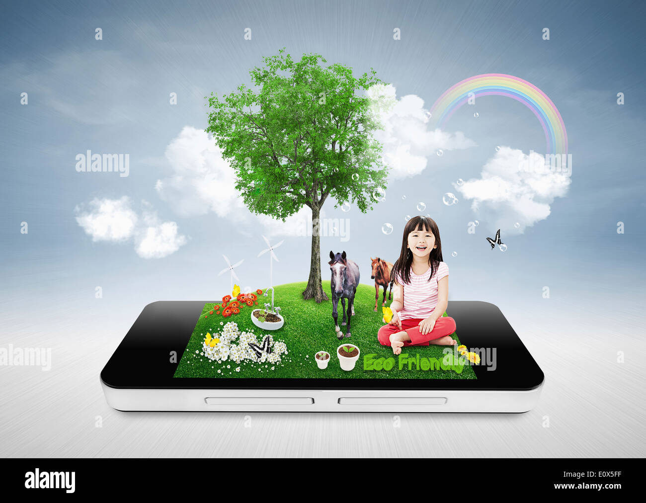 a nature view with a girl on a smart phone Stock Photo - Alamy