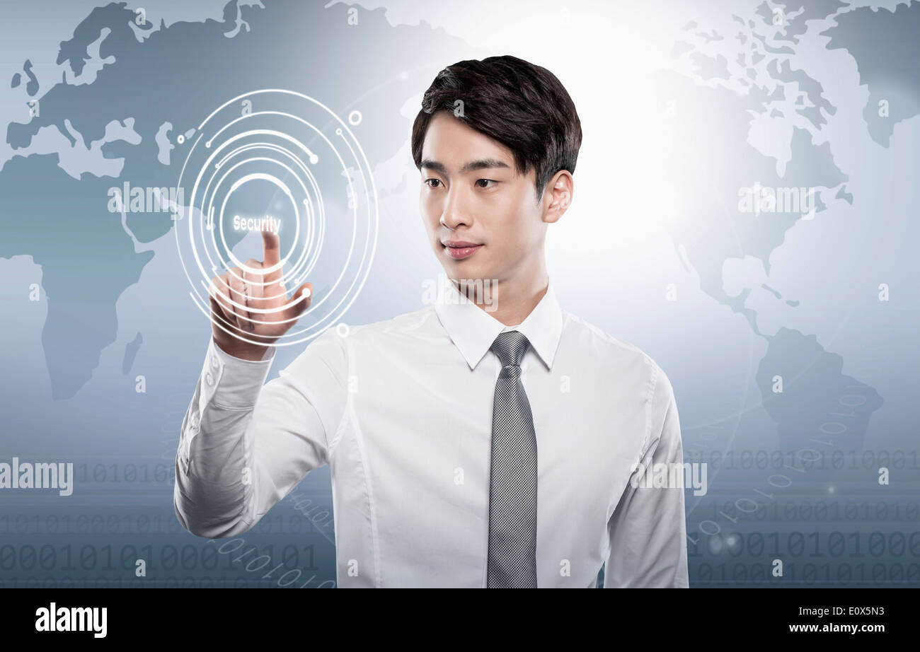 a business man pointing at a screen Stock Photo - Alamy