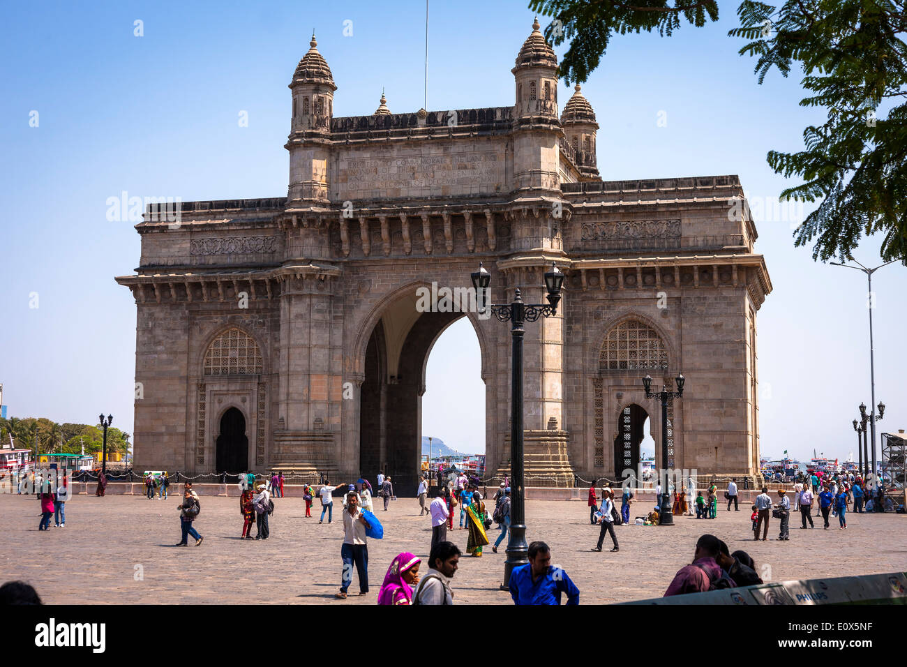 The Gates of India at dusk busy with visitors, Mumbai India Stock Photo ...
