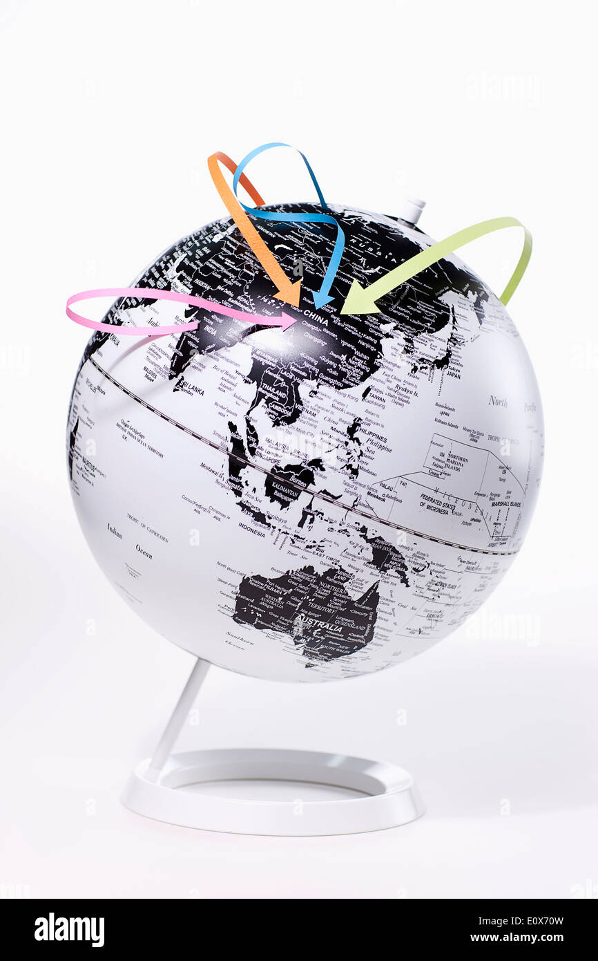 the globe with arrows pointing at china Stock Photo - Alamy