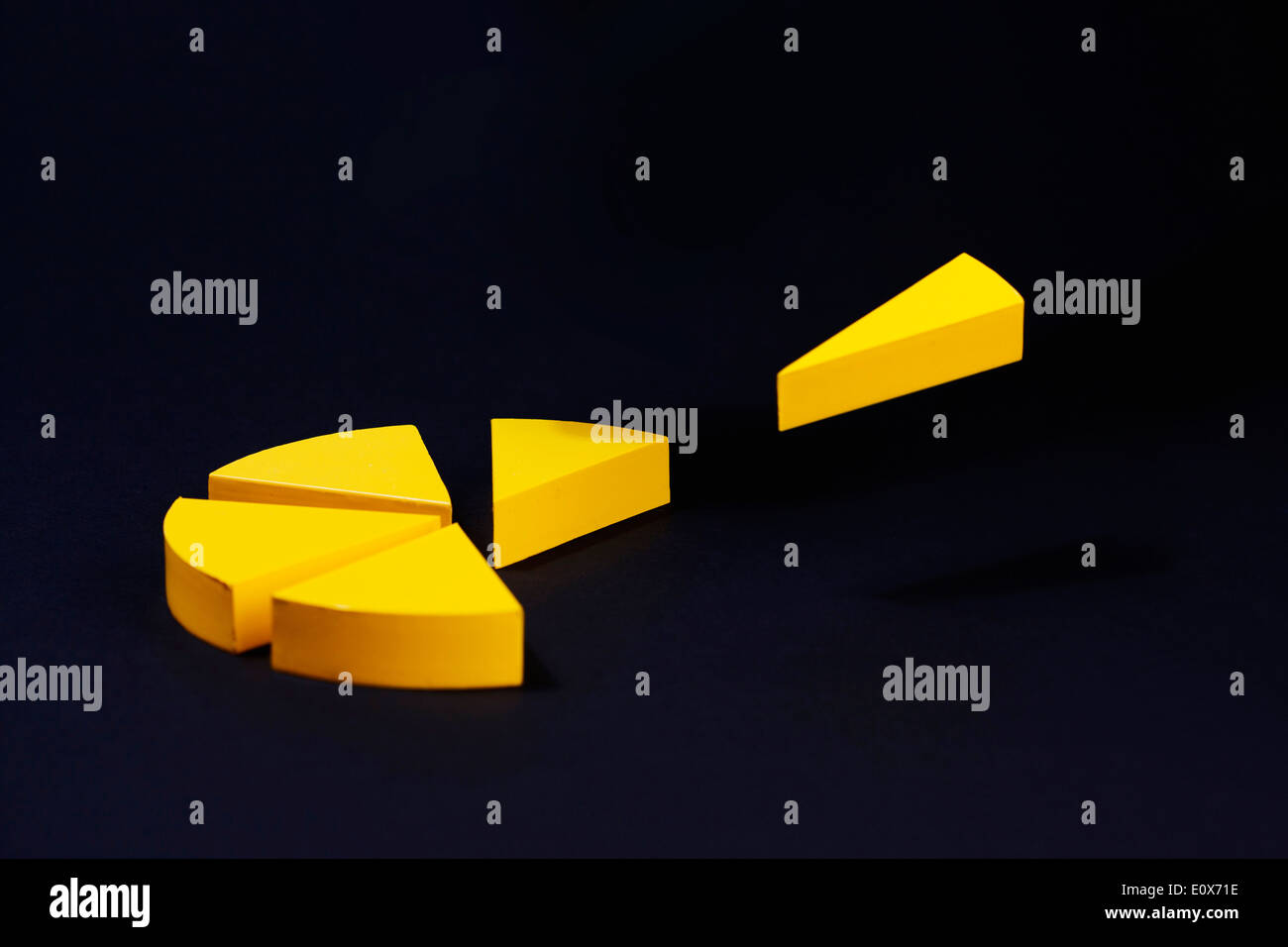 a yellow pie chart with a black background Stock Photo - Alamy