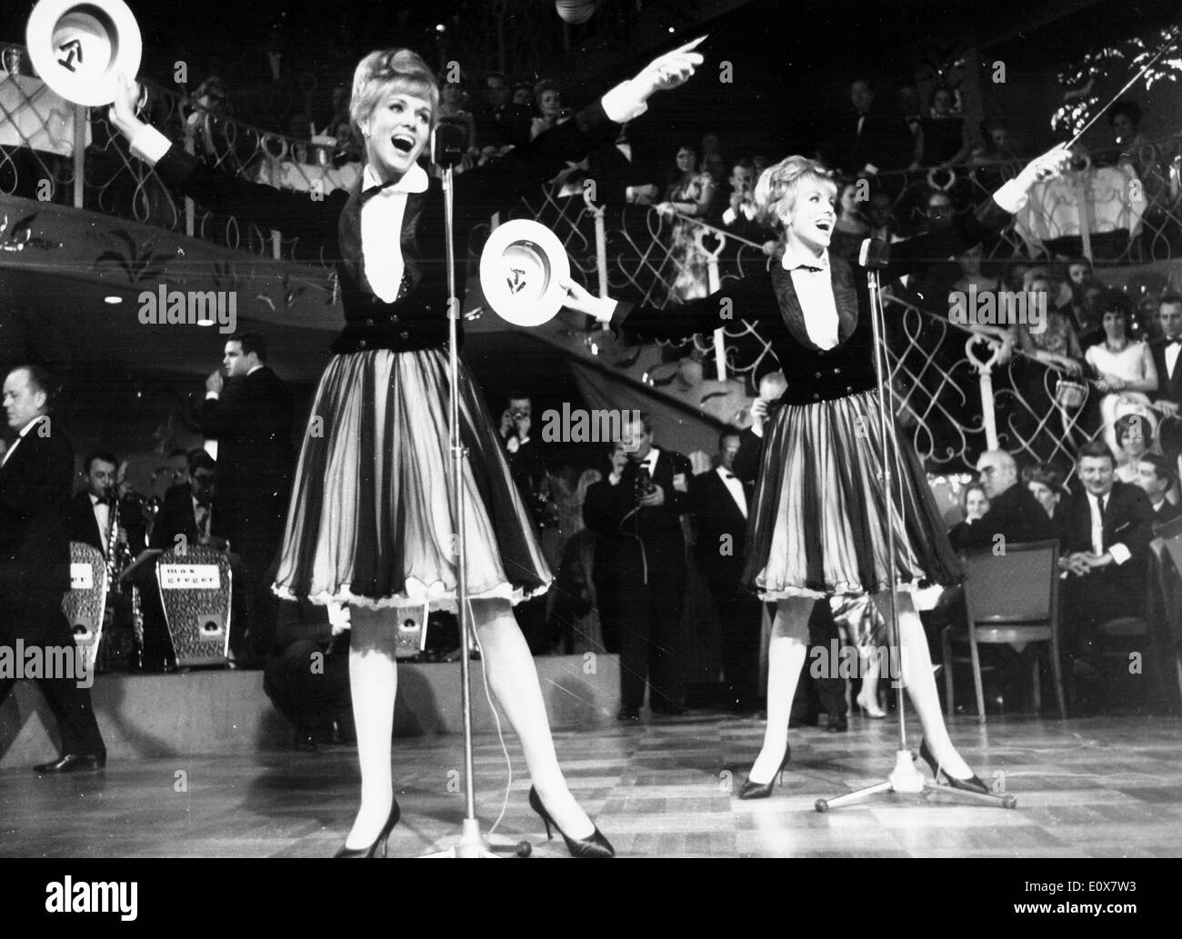 Performing Duo The Kessler Twins singing during a show Stock Photo - Alamy