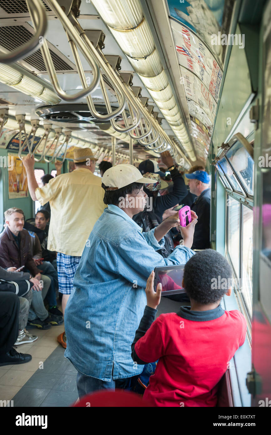 Subway enthusiasts as well as regular travelers ride the "Train of Many ...