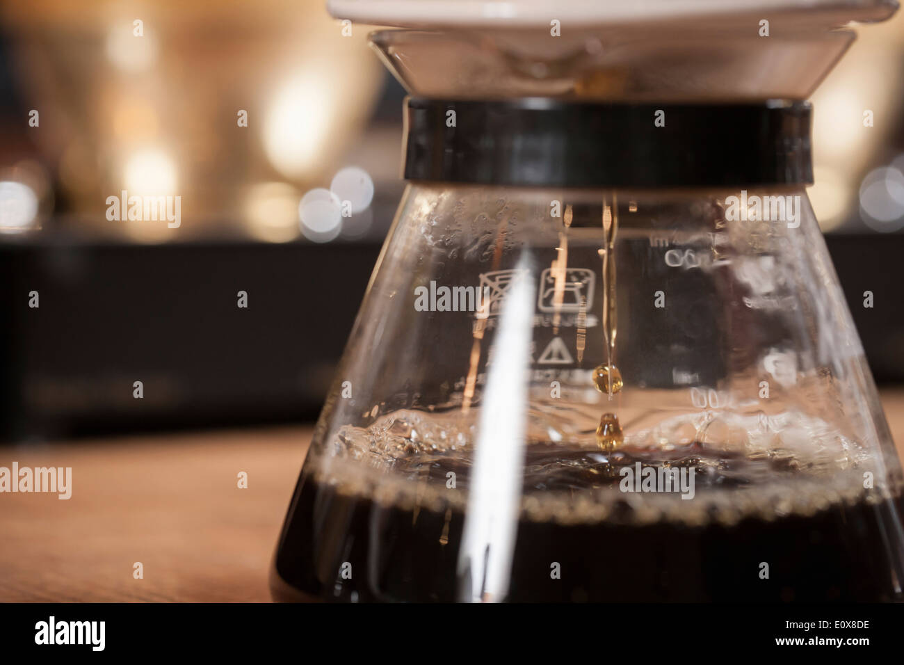 coffee falling into a coffee pot from filter Stock Photo - Alamy