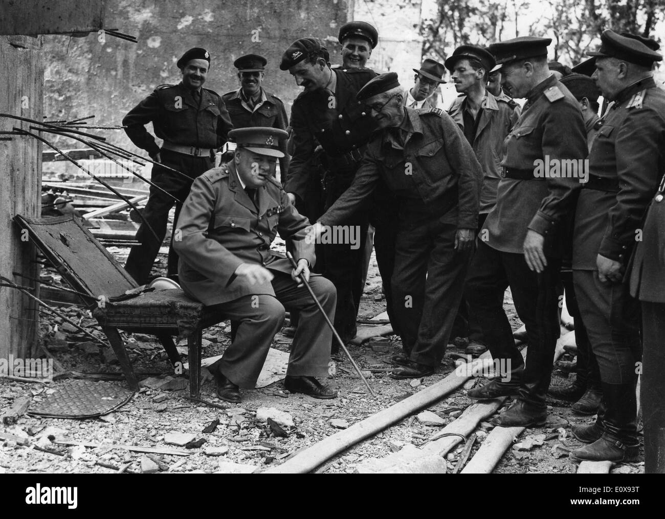 Sir Winston Churchill sits in Hitler's destroyed chair Stock Photo ...