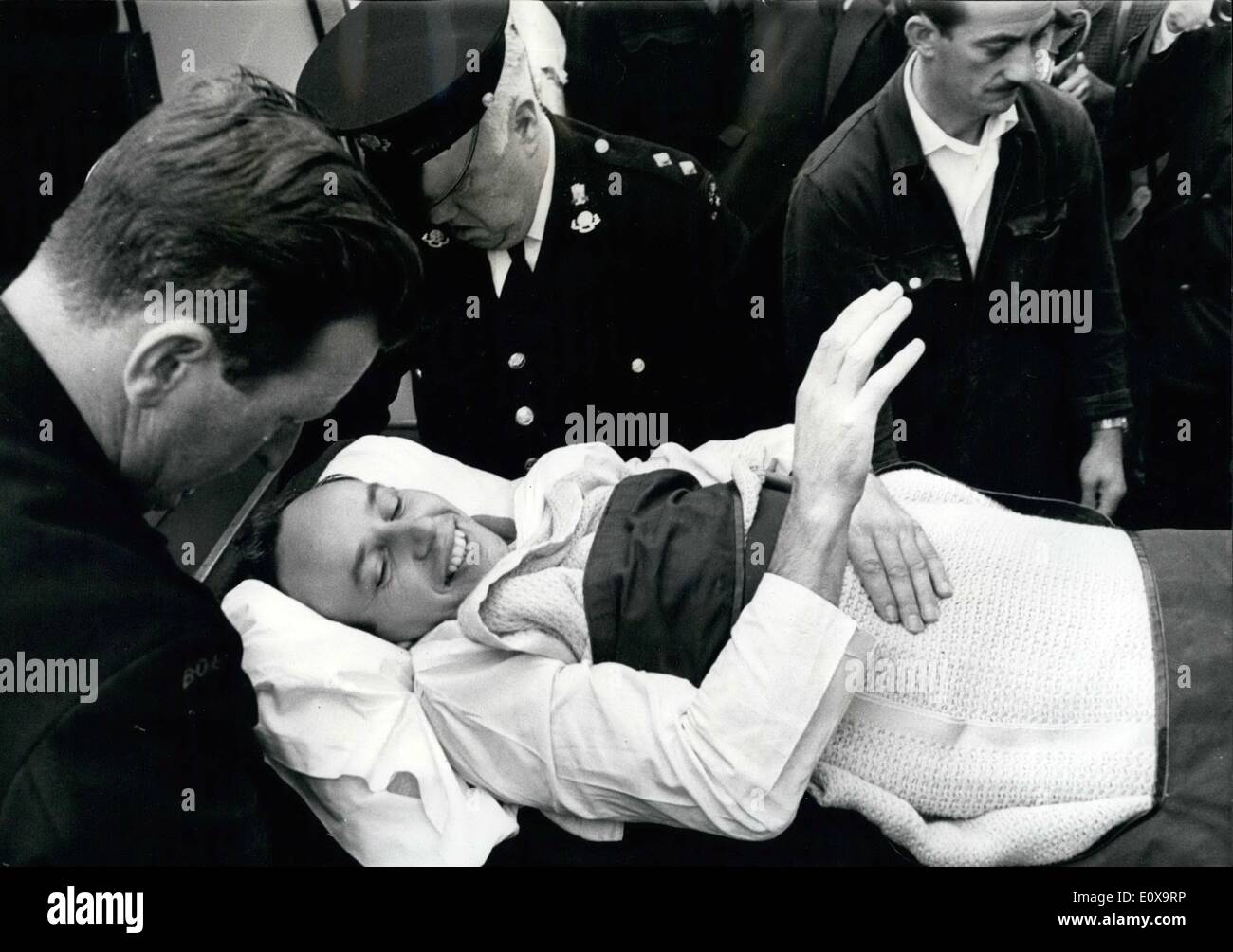 Oct. 10, 1965 - John Surtees arrives home after his crash in Canada ...