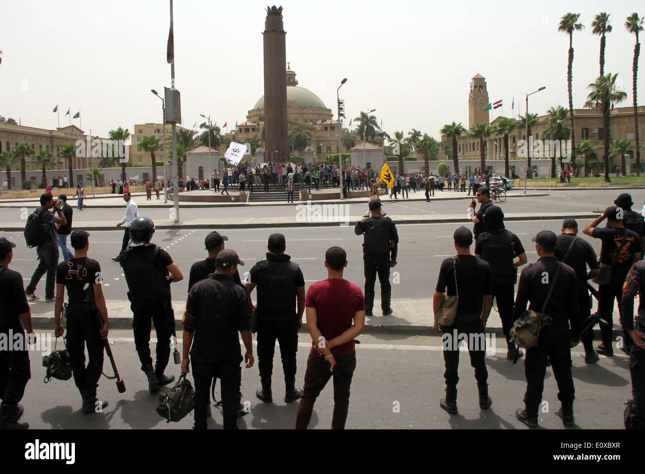 Giza, Cairo, Egypt. 20th May, 2014. Egyptian security forces take up position during as ...