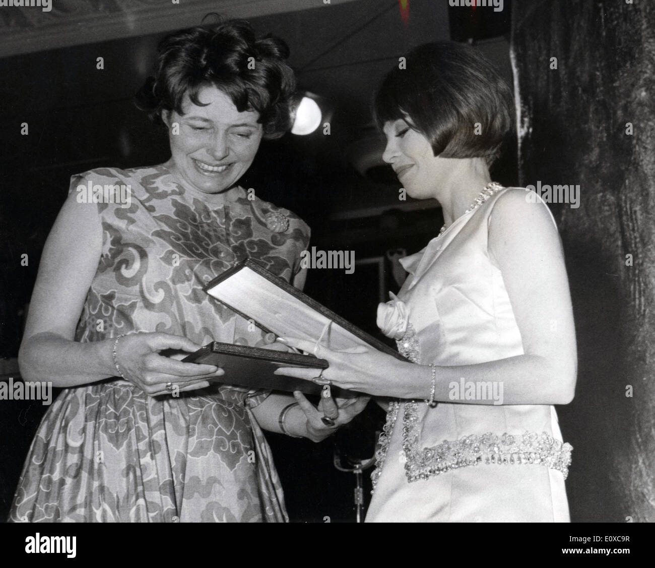 Mar. 24, 1966 - London, England, U.K. - Actress PATRICIA NEAL bursts ...