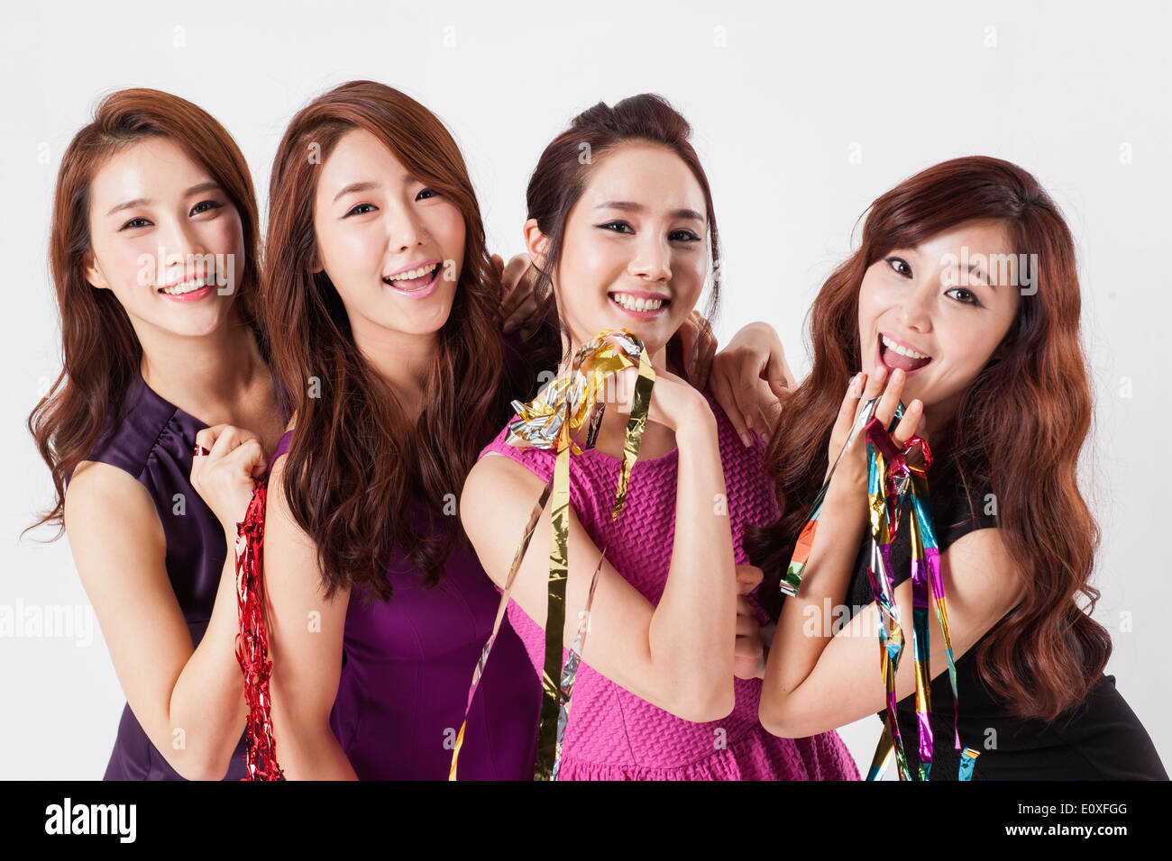 four women ready to party Stock Photo - Alamy