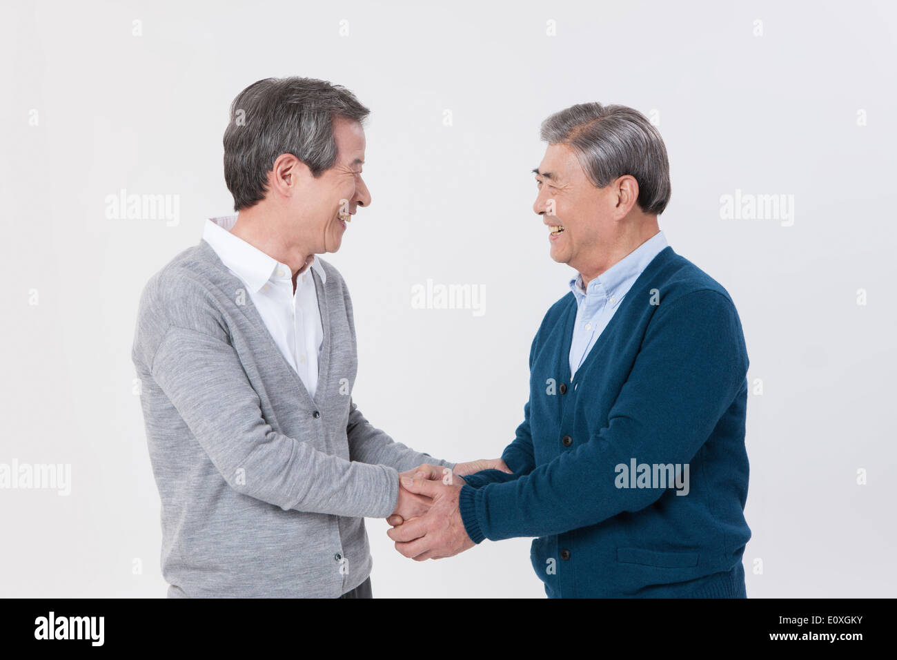 Face to face shaking hands hi-res stock photography and images - Alamy
