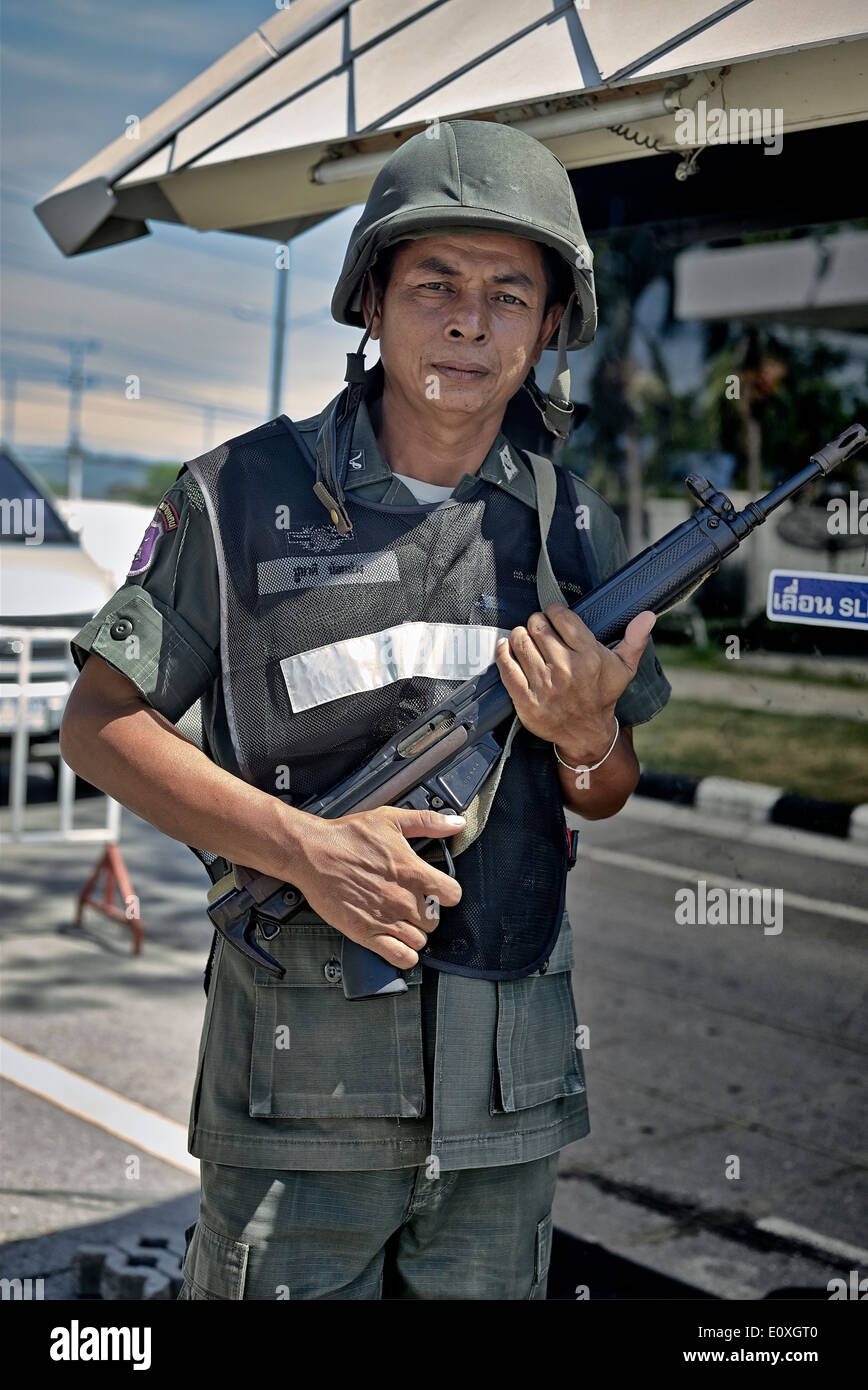 Thailand soldier armed at a Military checkpoint during the ...