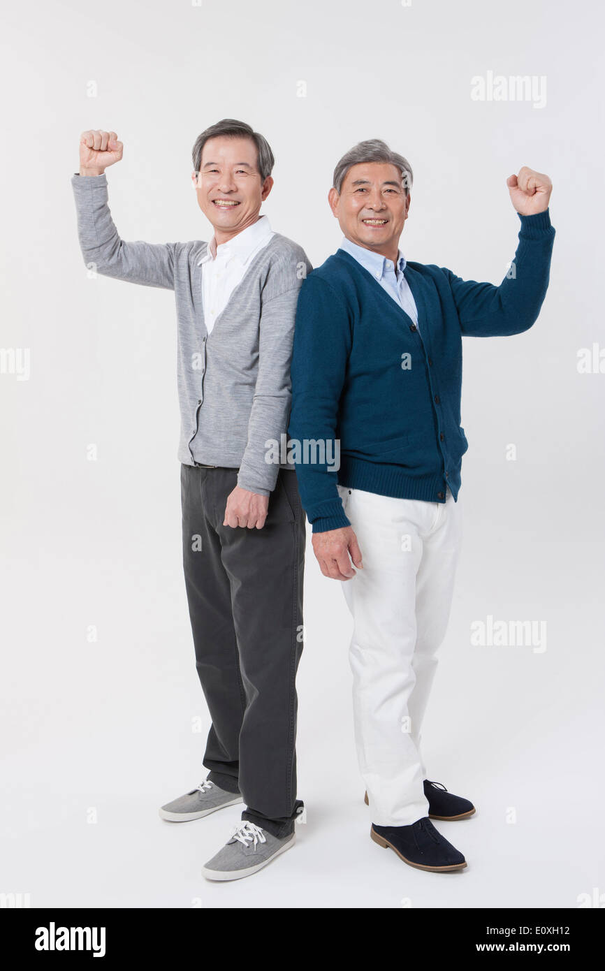 two old men cheering Stock Photo - Alamy