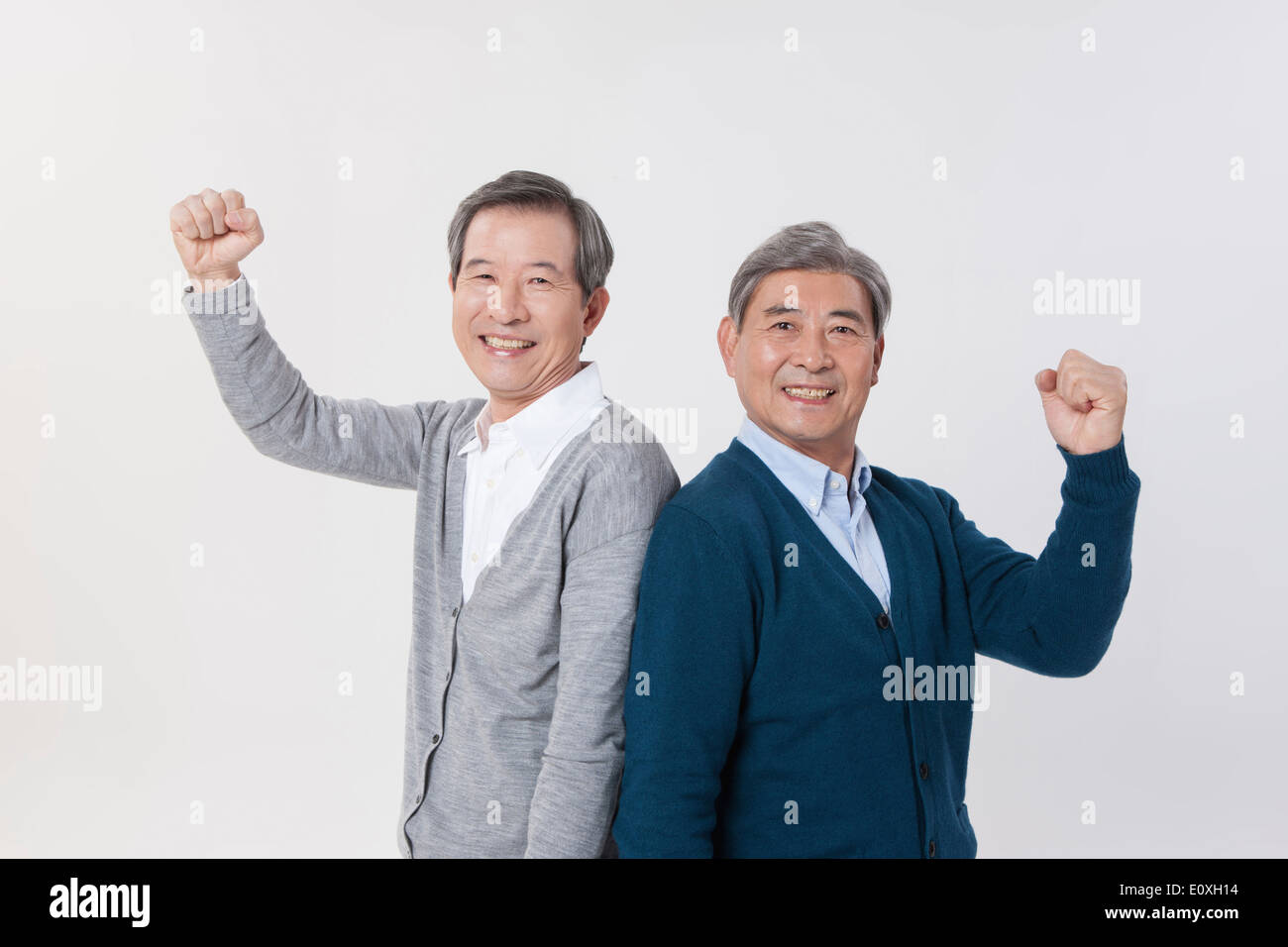 two old men cheering Stock Photo - Alamy