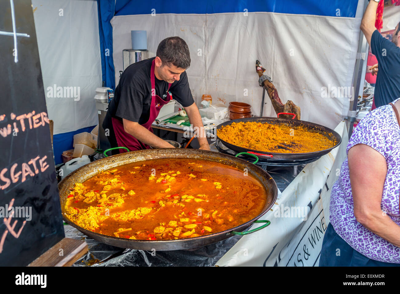 Chef making Paella at a street market Stock Photo - Alamy