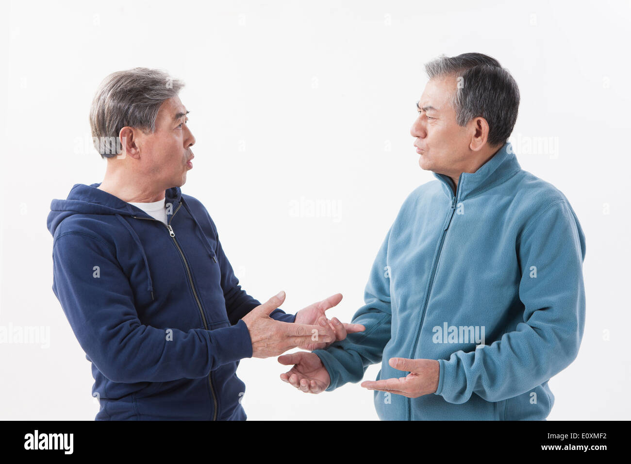 two old men having an argument Stock Photo - Alamy