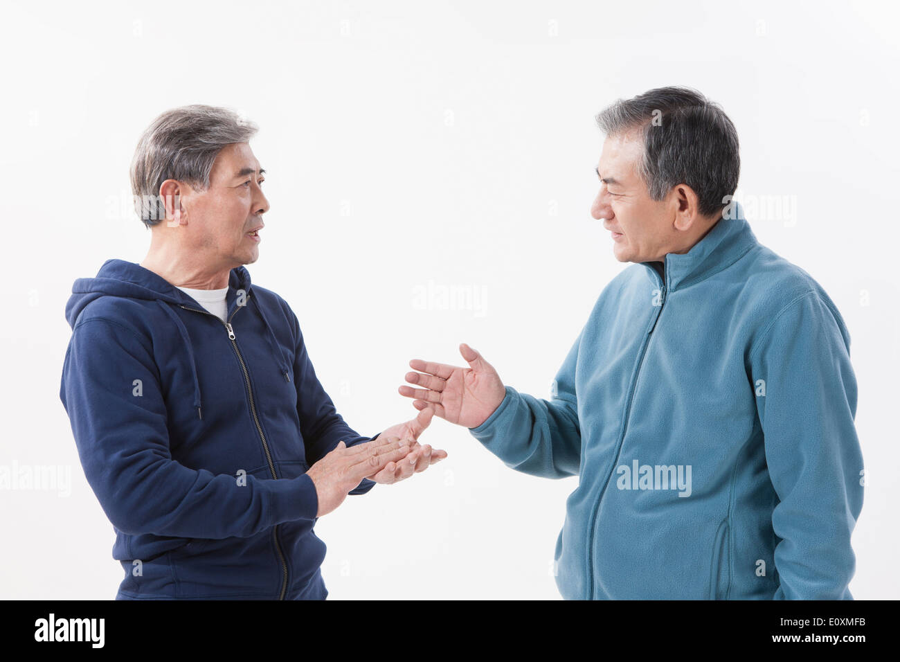 two old men having an argument Stock Photo - Alamy