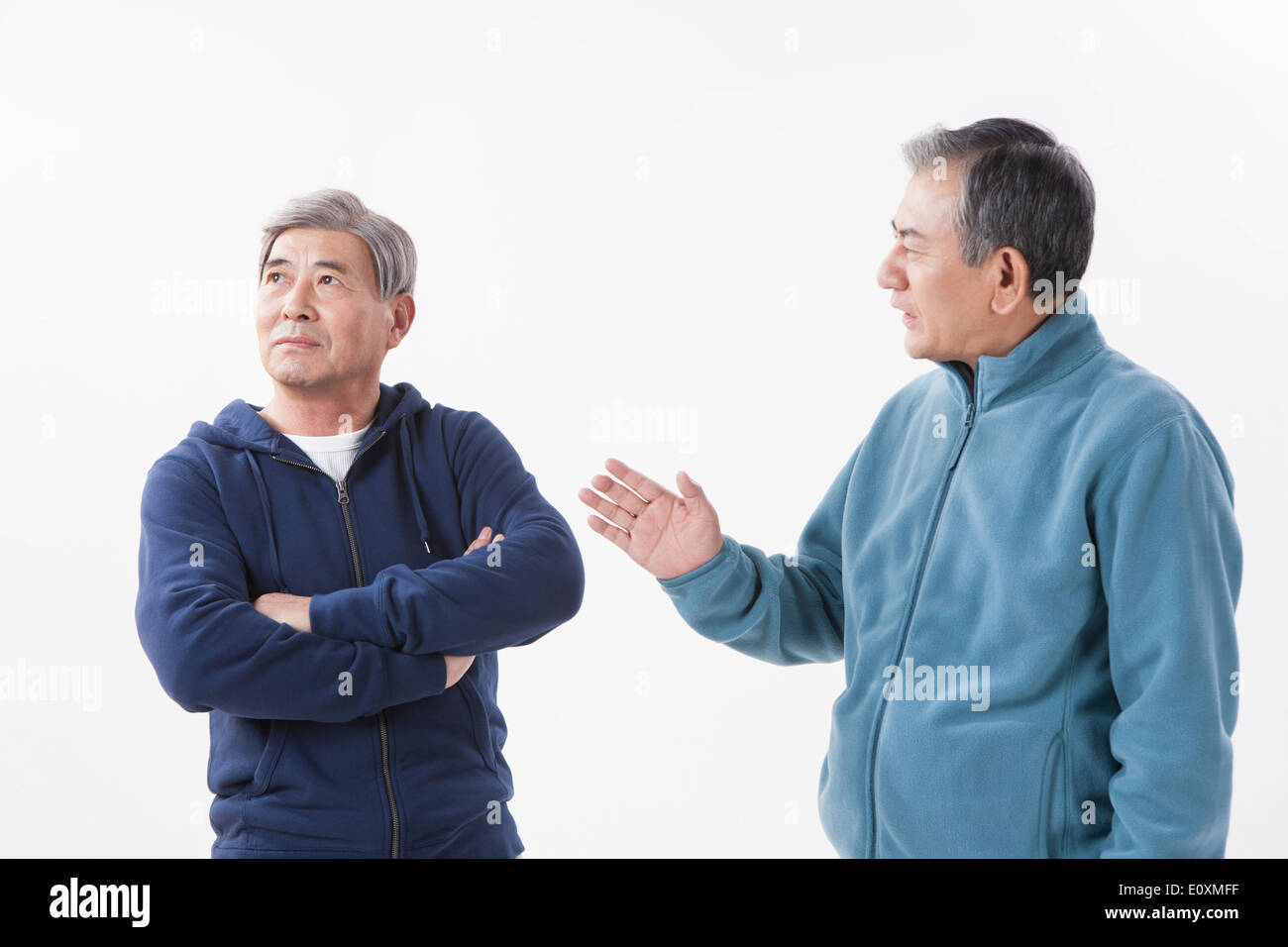 Argument arms crossed hi-res stock photography and images - Alamy