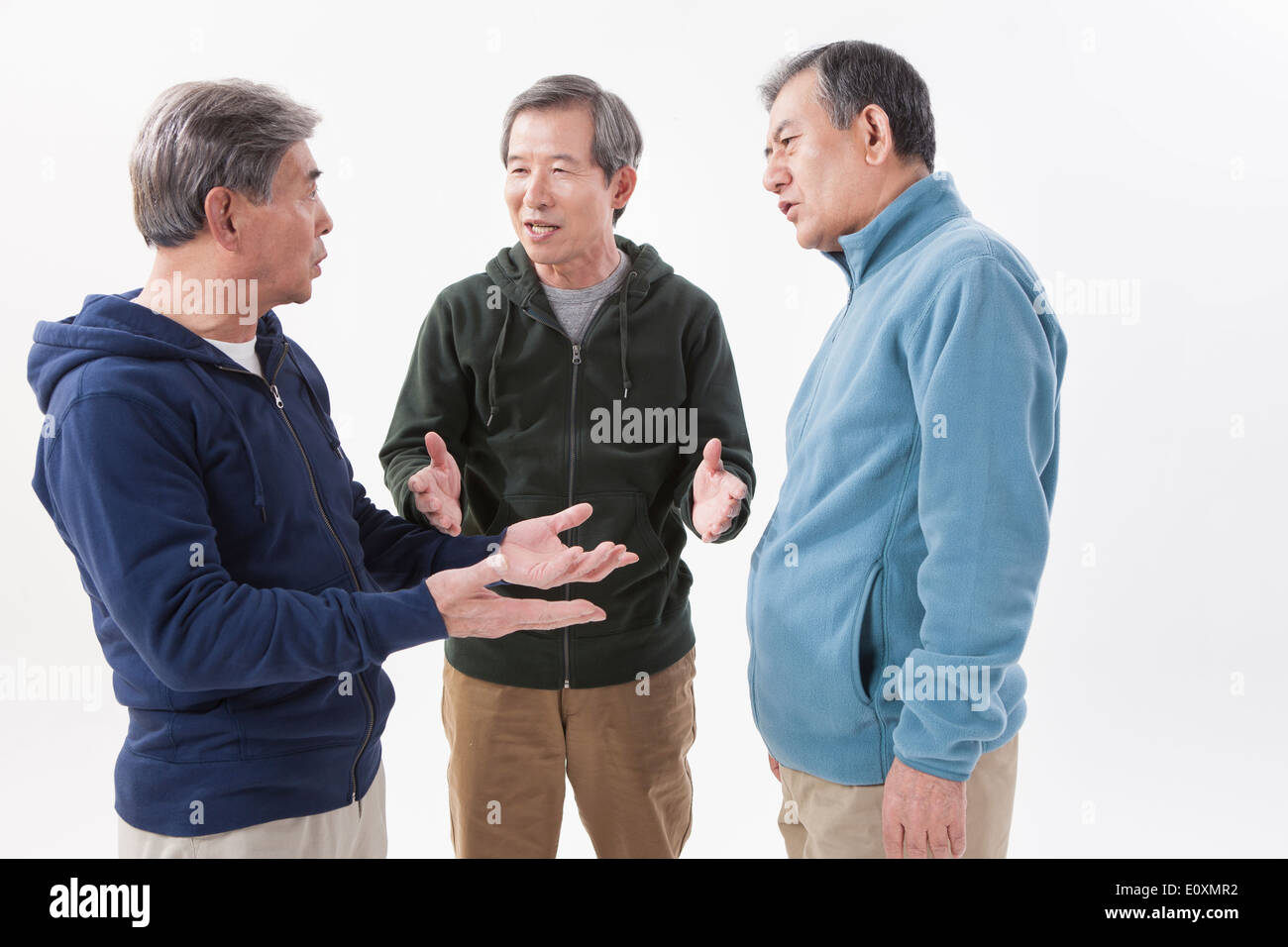 three old men having an argument Stock Photo - Alamy