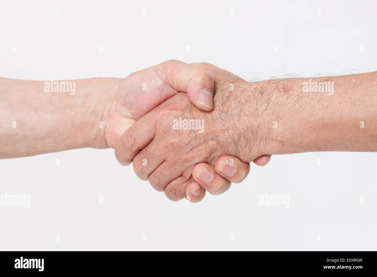 old people shaking hands Stock Photo - Alamy