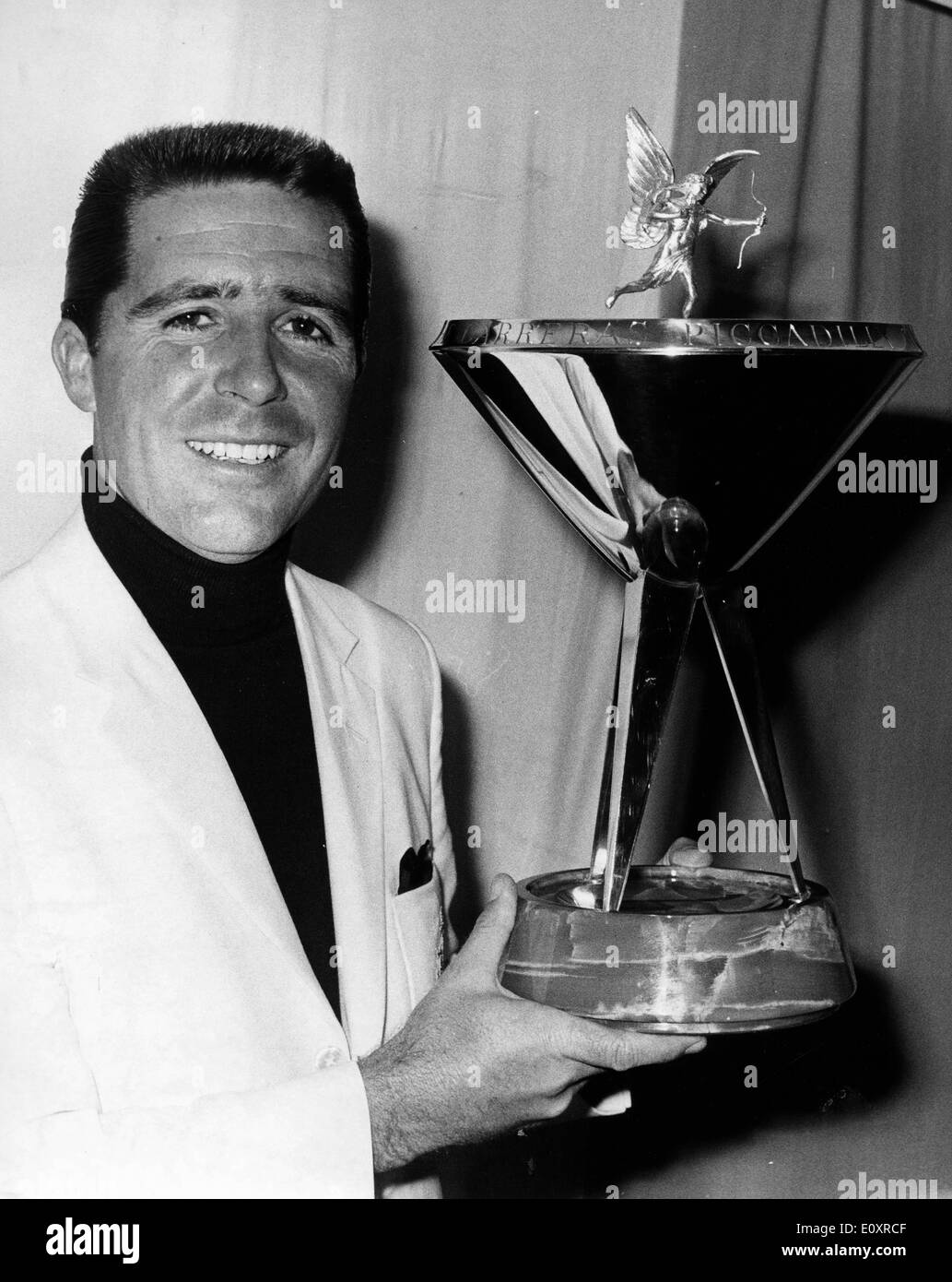 Golfer Gary Player with his trophy from the Piccadilly World Match ...