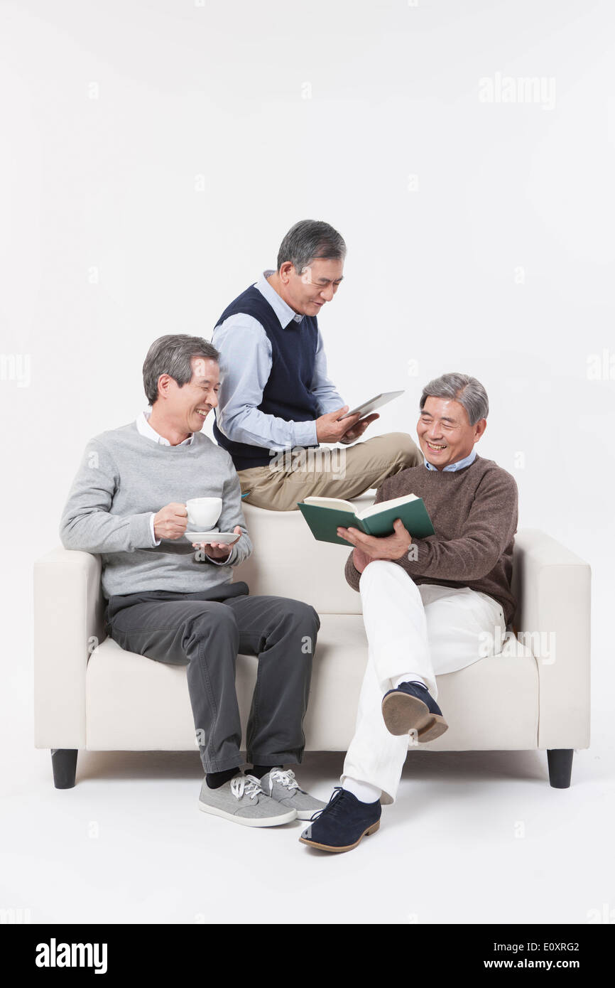 three old men on a couch Stock Photo - Alamy